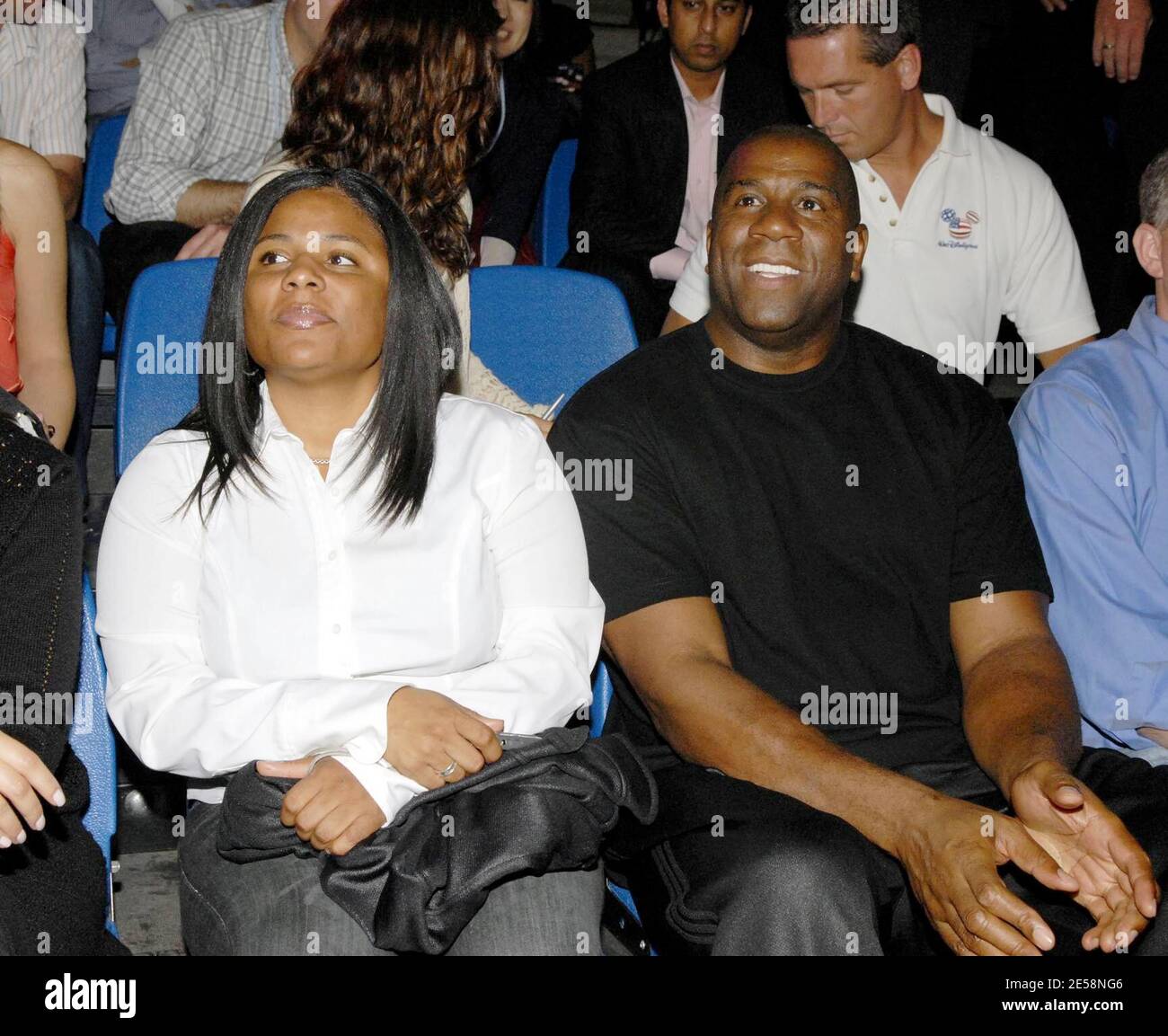 Magic Johnson is the honored guest at a charity basketball game in ...
