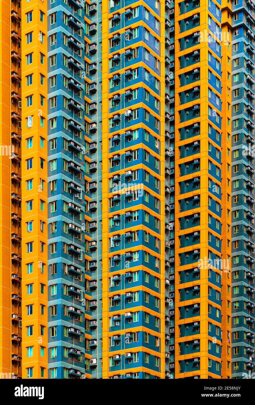 Orange and blue high rise flats in Kowloon, Hong Kong Stock Photo - Alamy