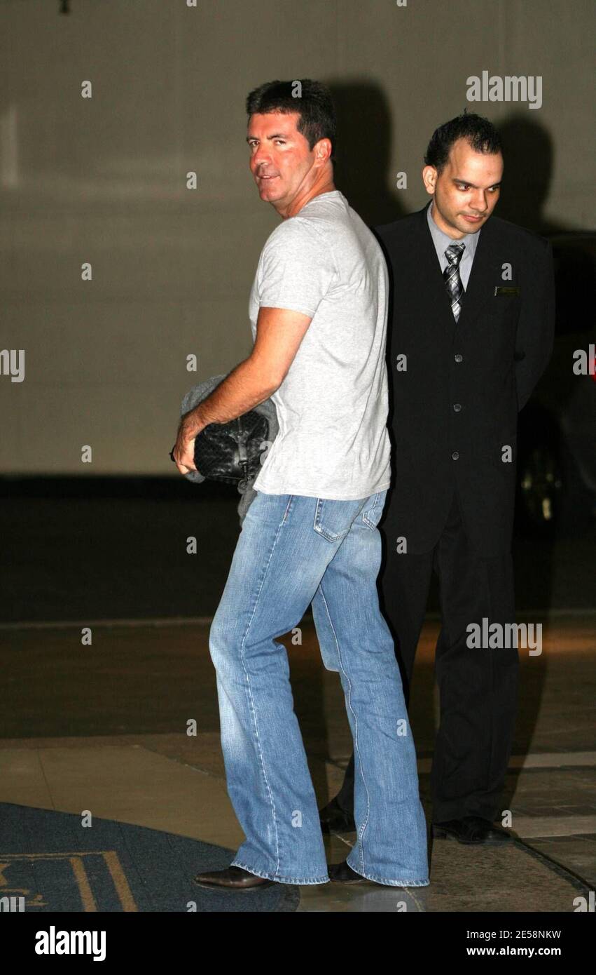 Exclusive!! Simon Cowell and Randy Jackson arrive at a Miami hotel to ...