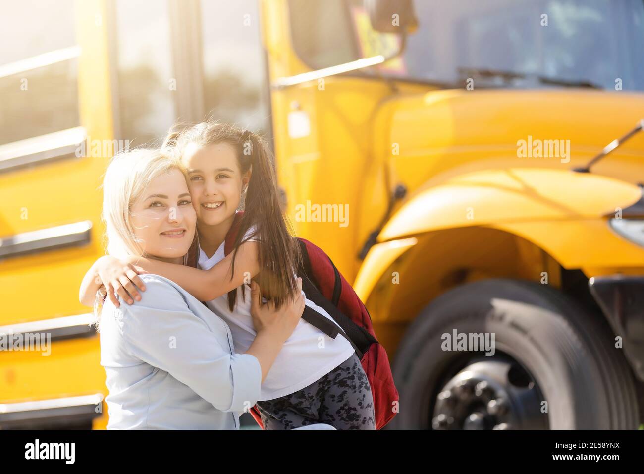 Kindergarten girl goodbye to mother hi-res stock photography and images ...