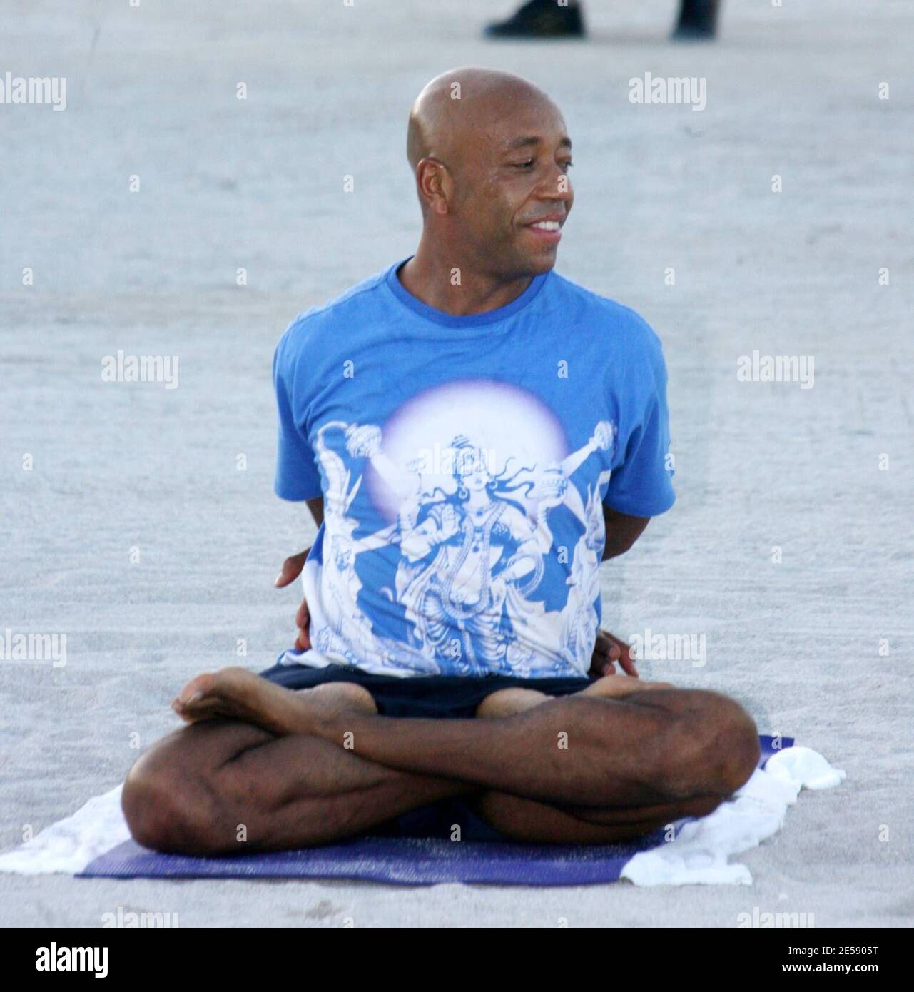 Hip Hop Mogul Russell Simmons does yoga class on Miami Beach with his ...