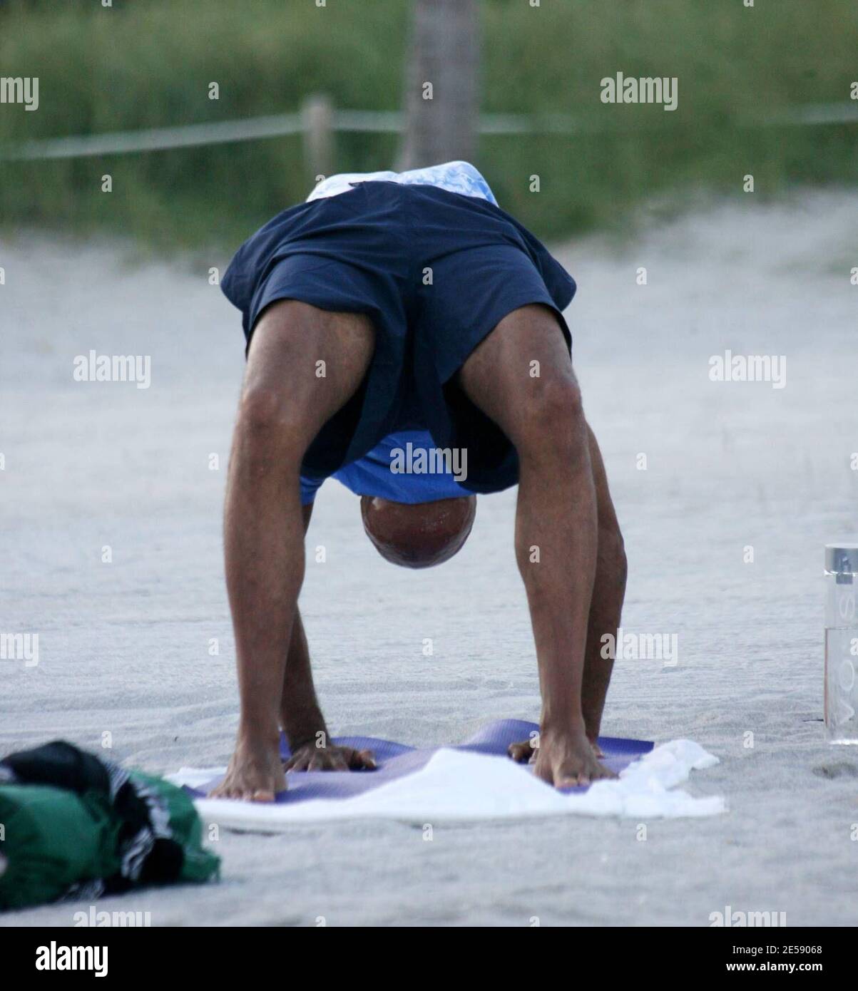 Hip Hop Mogul Russell Simmons does yoga class on Miami Beach with his ...