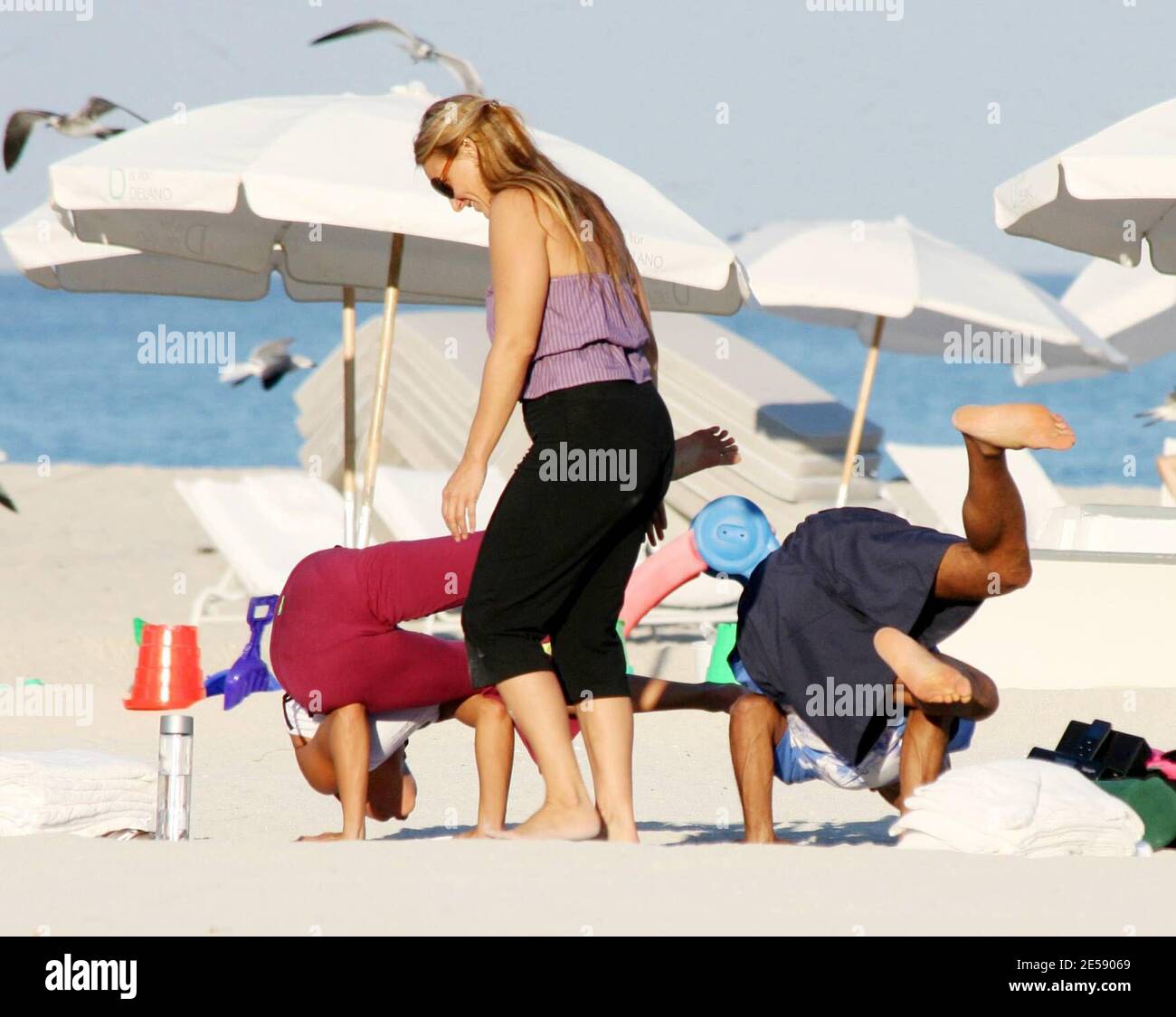 Hip Hop Mogul Russell Simmons does yoga class on Miami Beach with his ...