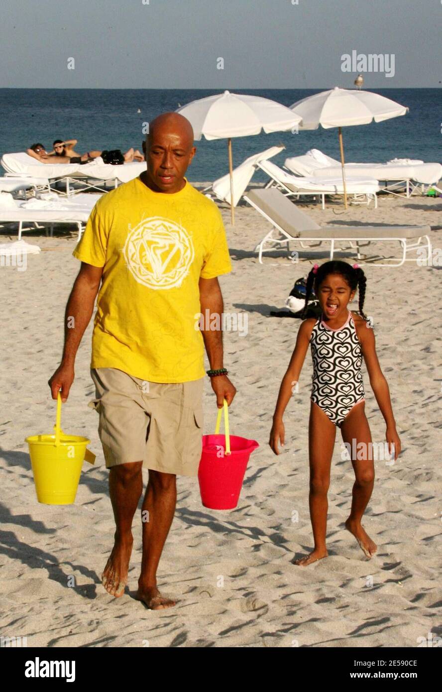 Hip Hop Mogul Russell Simmons takes daughters Ming Lee and Aoki Lee ...