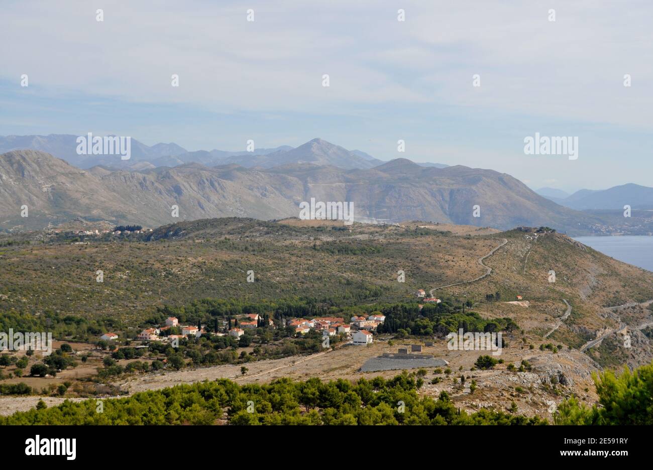 European countryside with road and village in the mountains Stock Photo ...