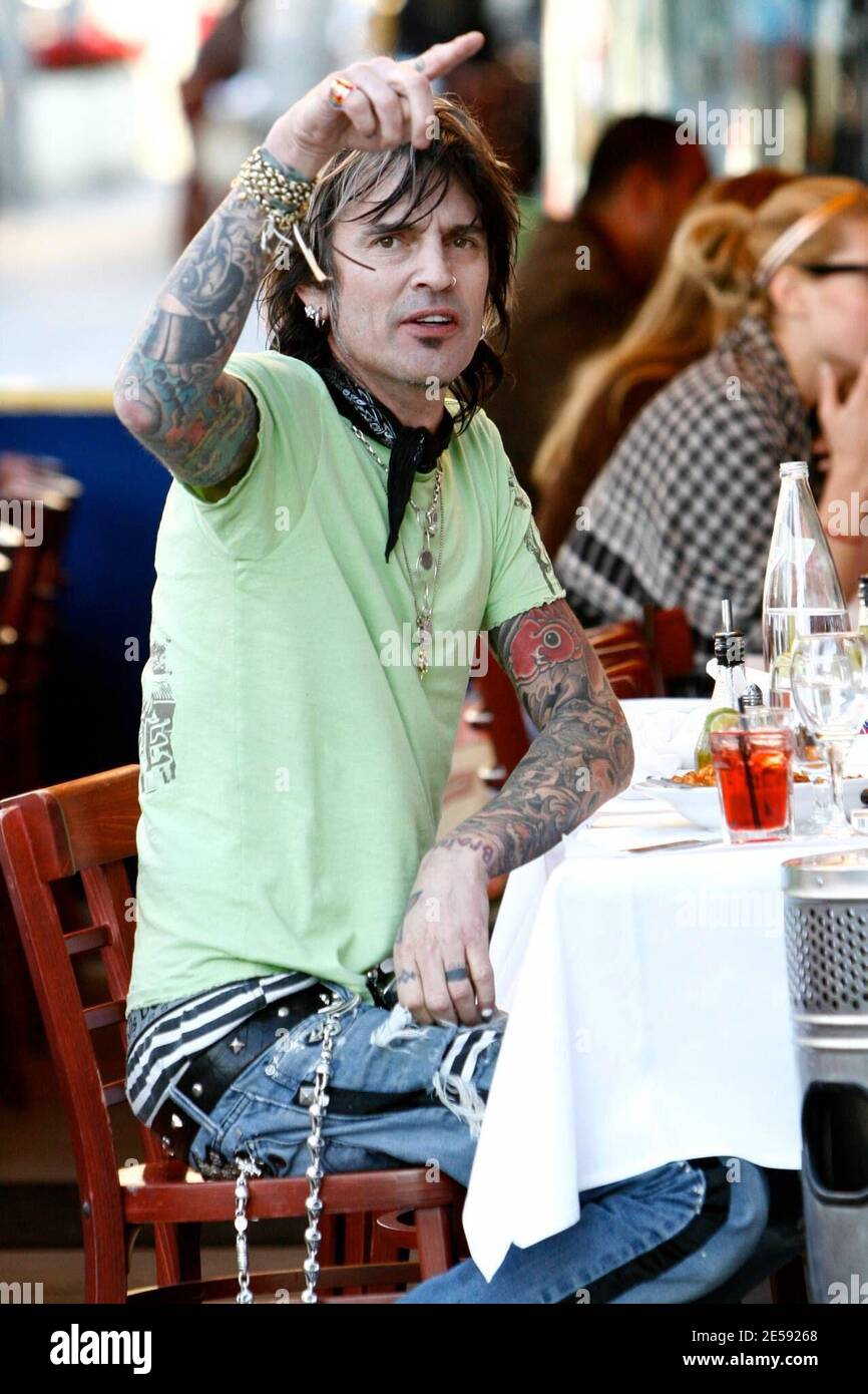 Exclusive!! Tommy Lee seems a bit agitated to see photographers as he ...