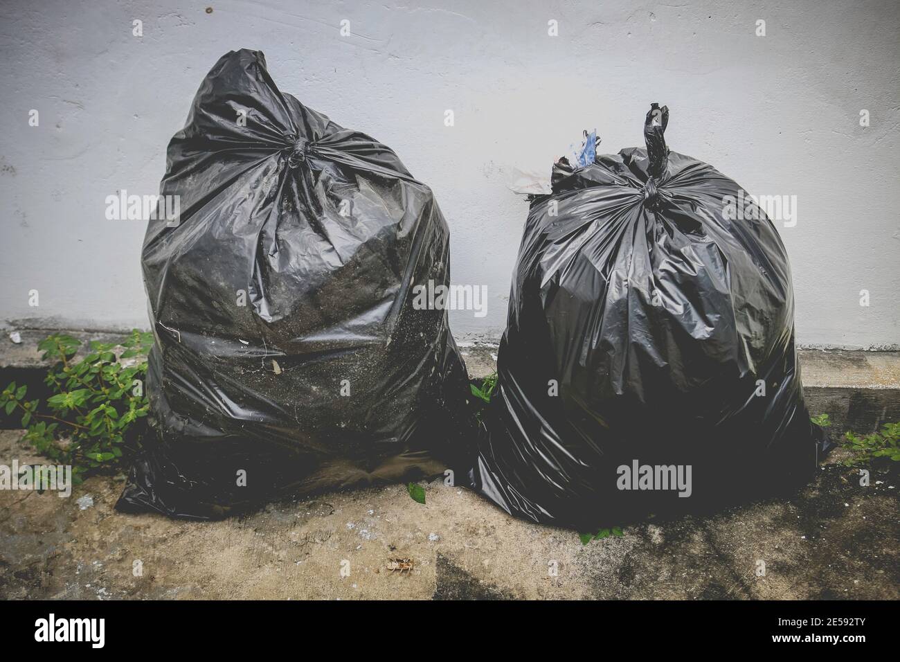 Pile of black garbage on the corner of wall, pollution trash Stock ...