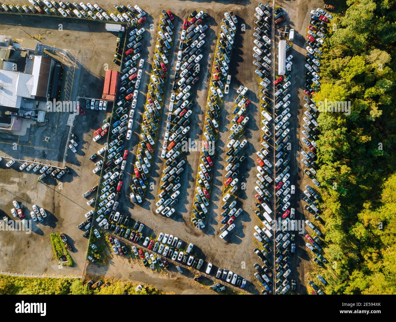 Aerial view of many used car auction lot parked distributed in a ...