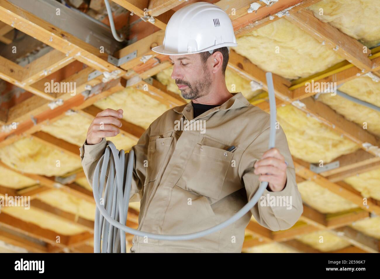 mounting for an electric cable in ceiling Stock Photo - Alamy