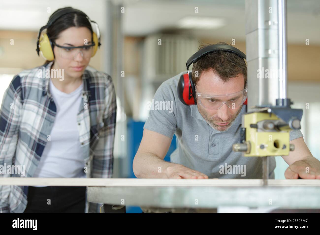 team of carpenters working with wood Stock Photo - Alamy