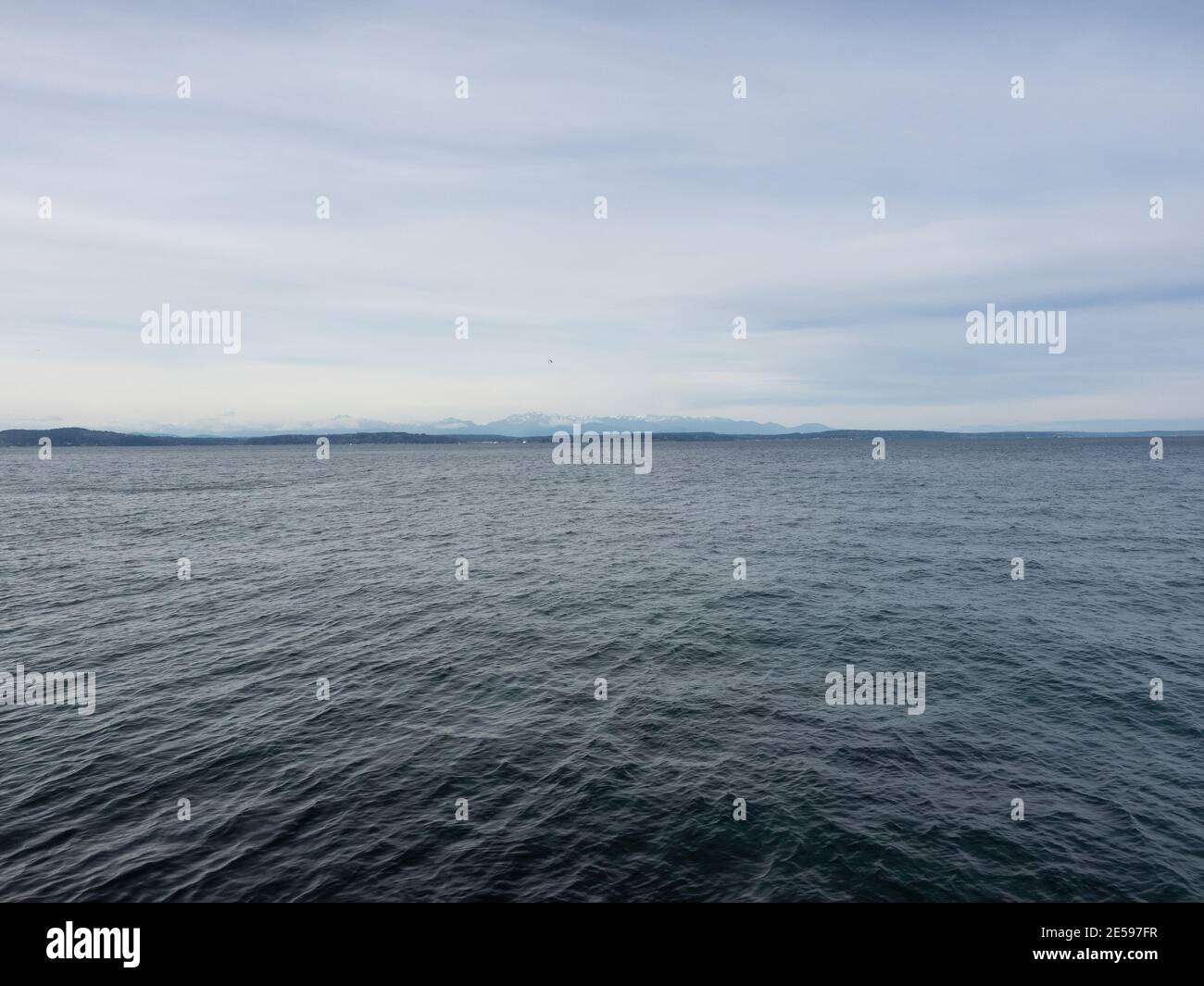 Seattle's waterfront viewed across Puget Sound from Alki Beach Park ...