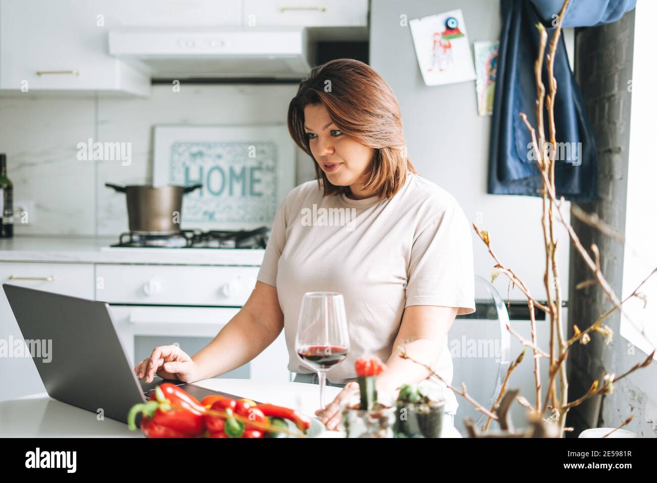 Beautiful smiling brunette young woman plus size body positive using ...