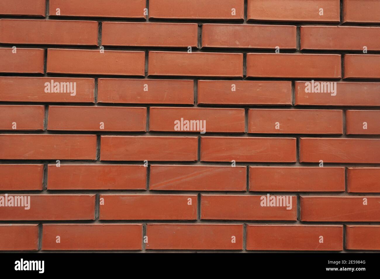 The texture of an old brick wall with natural defects. Scratches ...