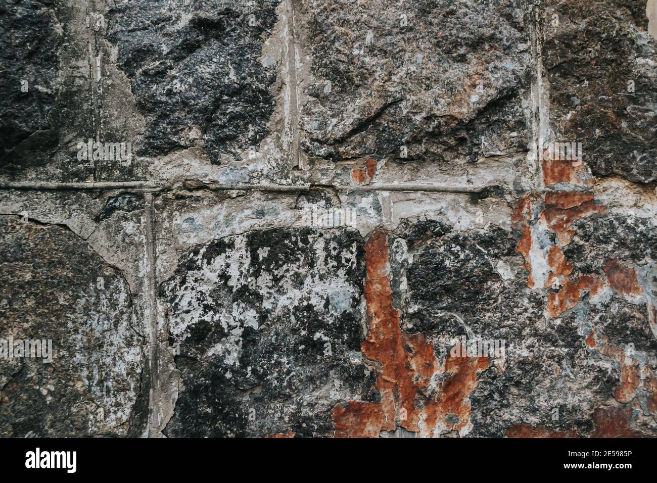 The texture of a stone medieval castle wall with natural defects ...