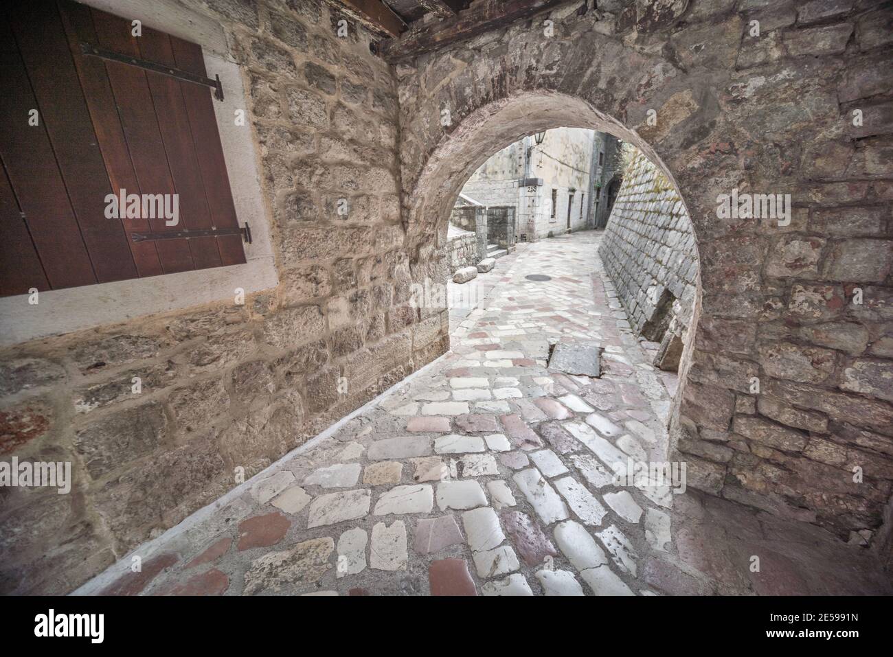 Characterful arches inter-connect the winding historic tiled pathways ...