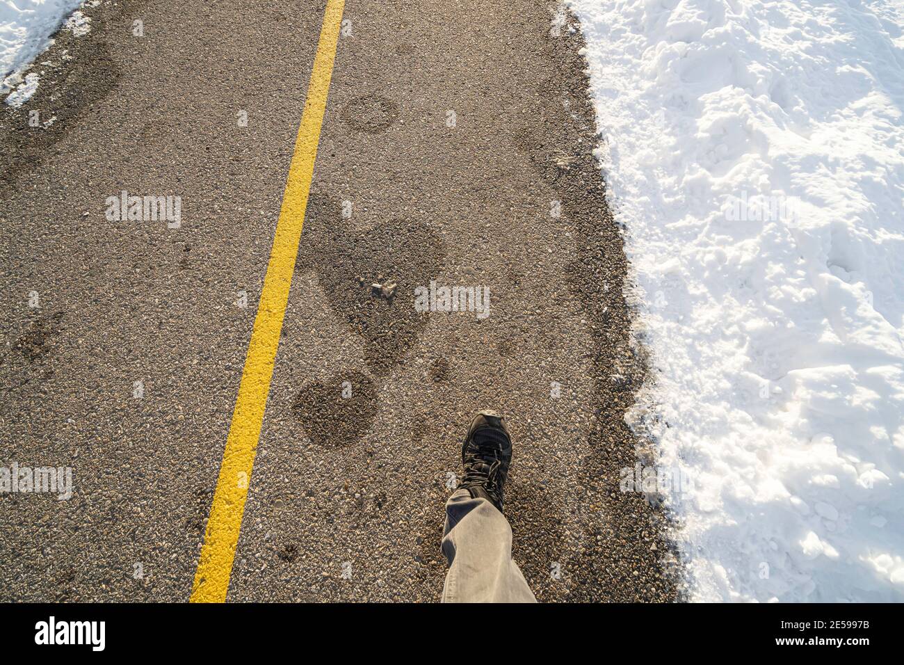 Man taking 1st step of long journey Stock Photo - Alamy