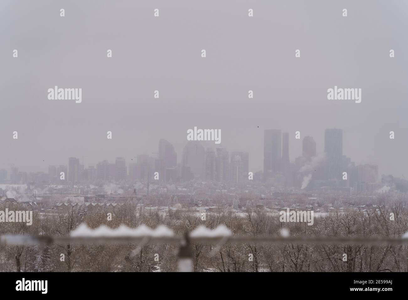 Downtown Calgary City Skyline through winter Fog Stock Photo - Alamy