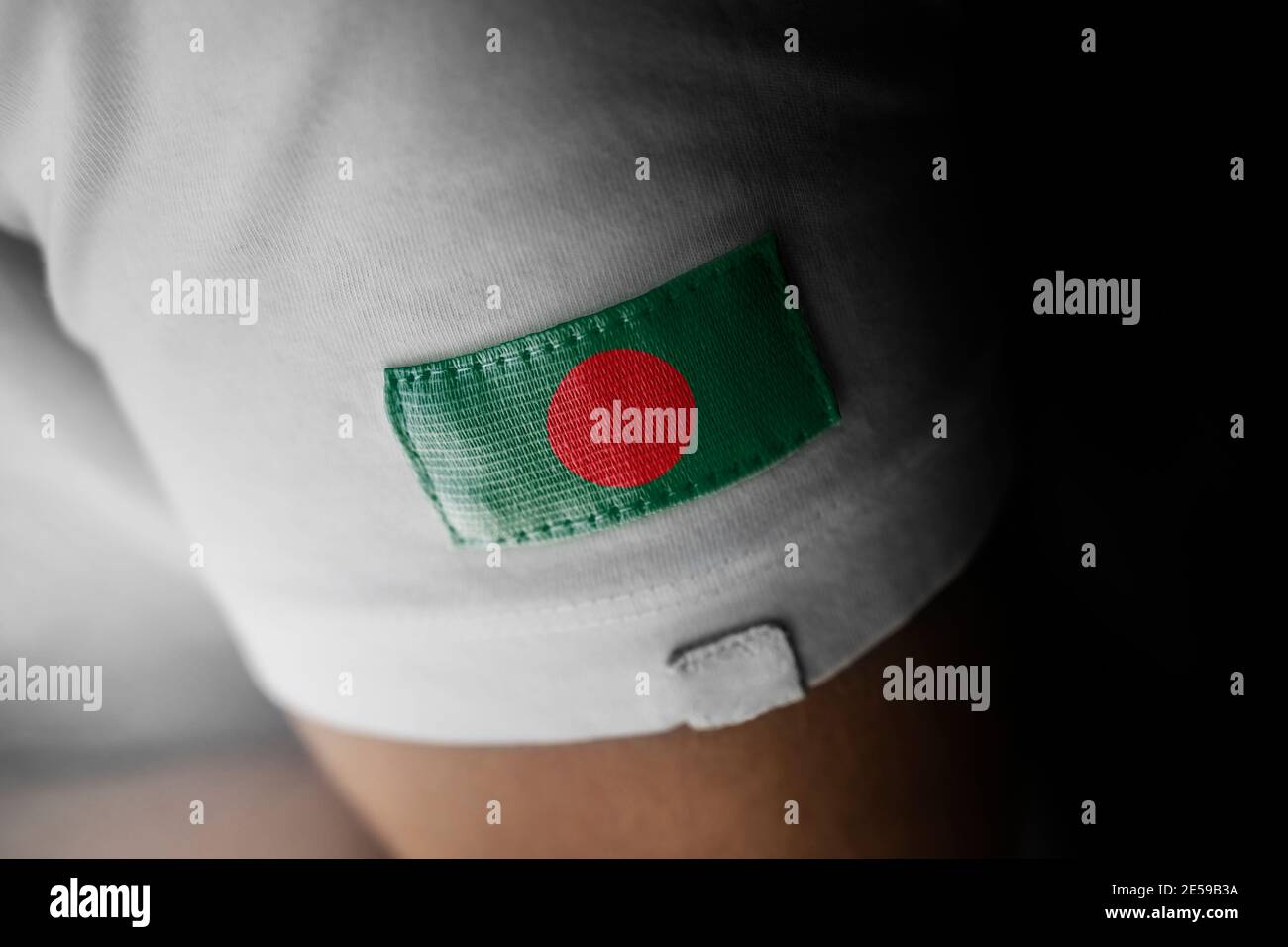 Patch of the national flag of the Bangladesh on a white t-shirt Stock Photo - Alamy