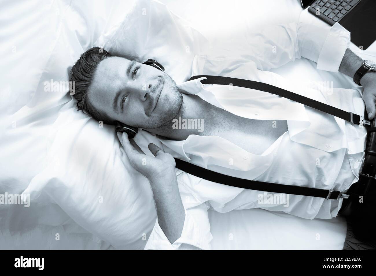 One man bed sheets hi-res stock photography and images - Alamy