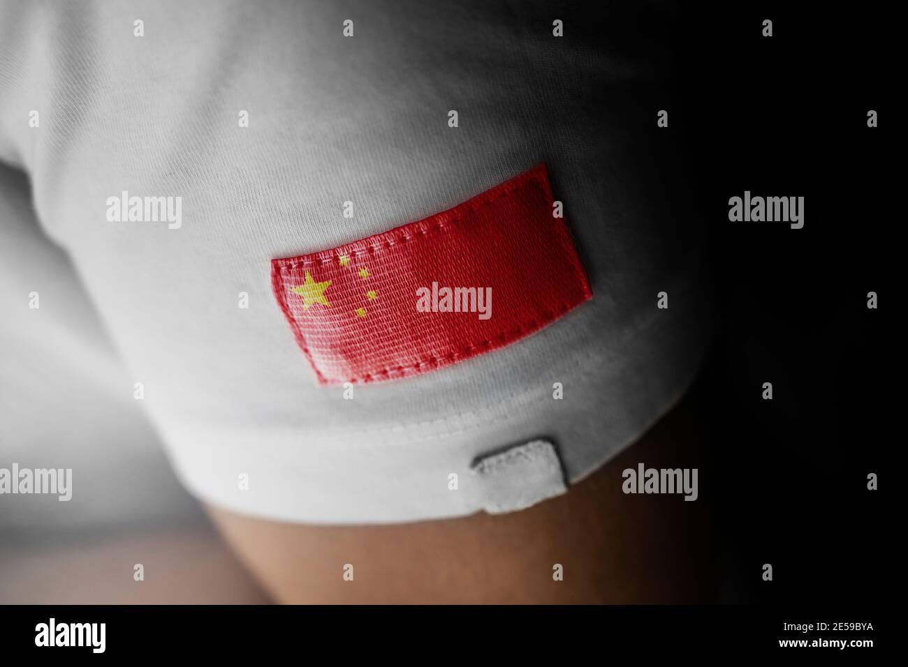 Patch of the national flag of the China on a white t-shirt Stock Photo ...