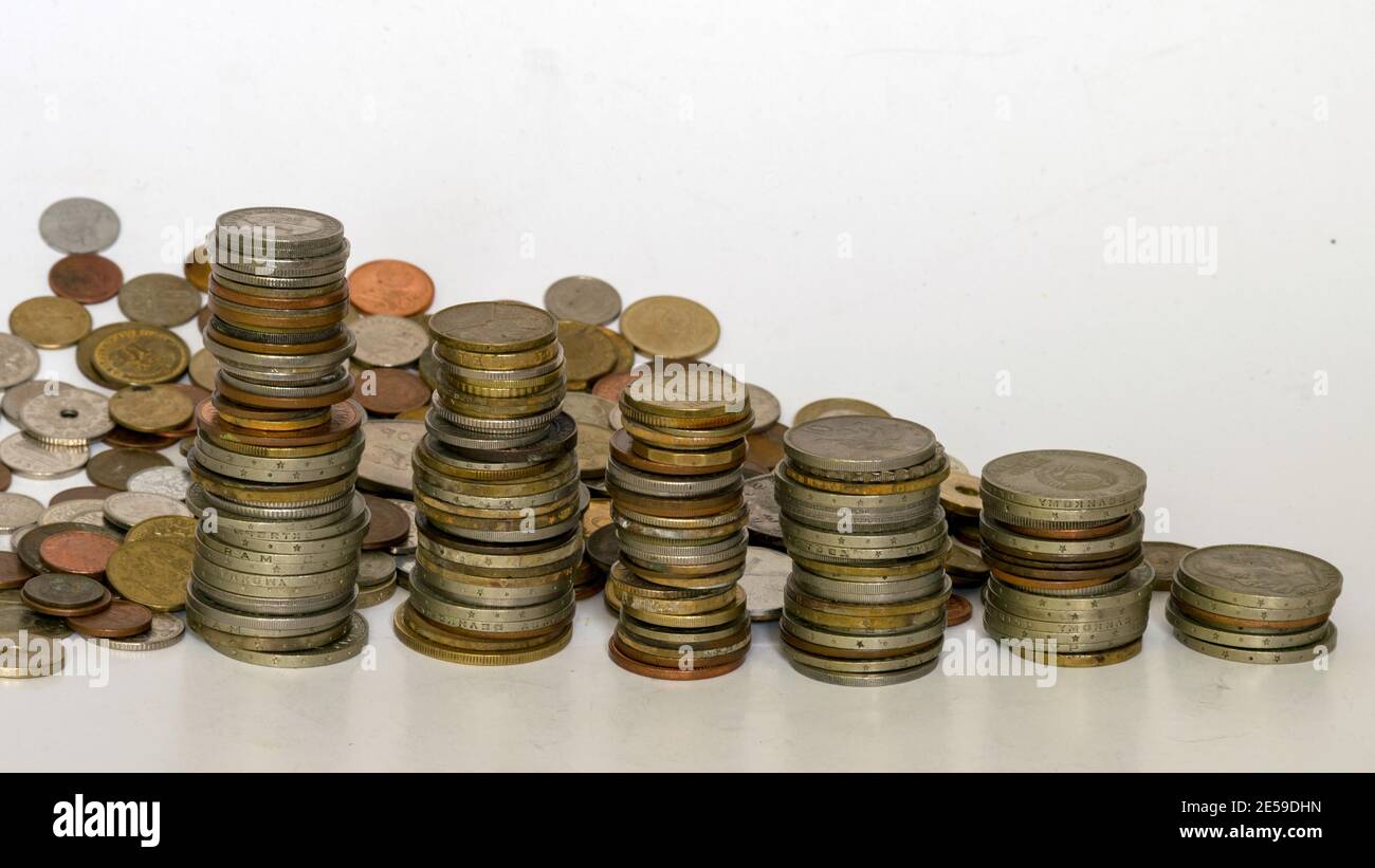 photography with metal coins of different shapes, countries and values ...