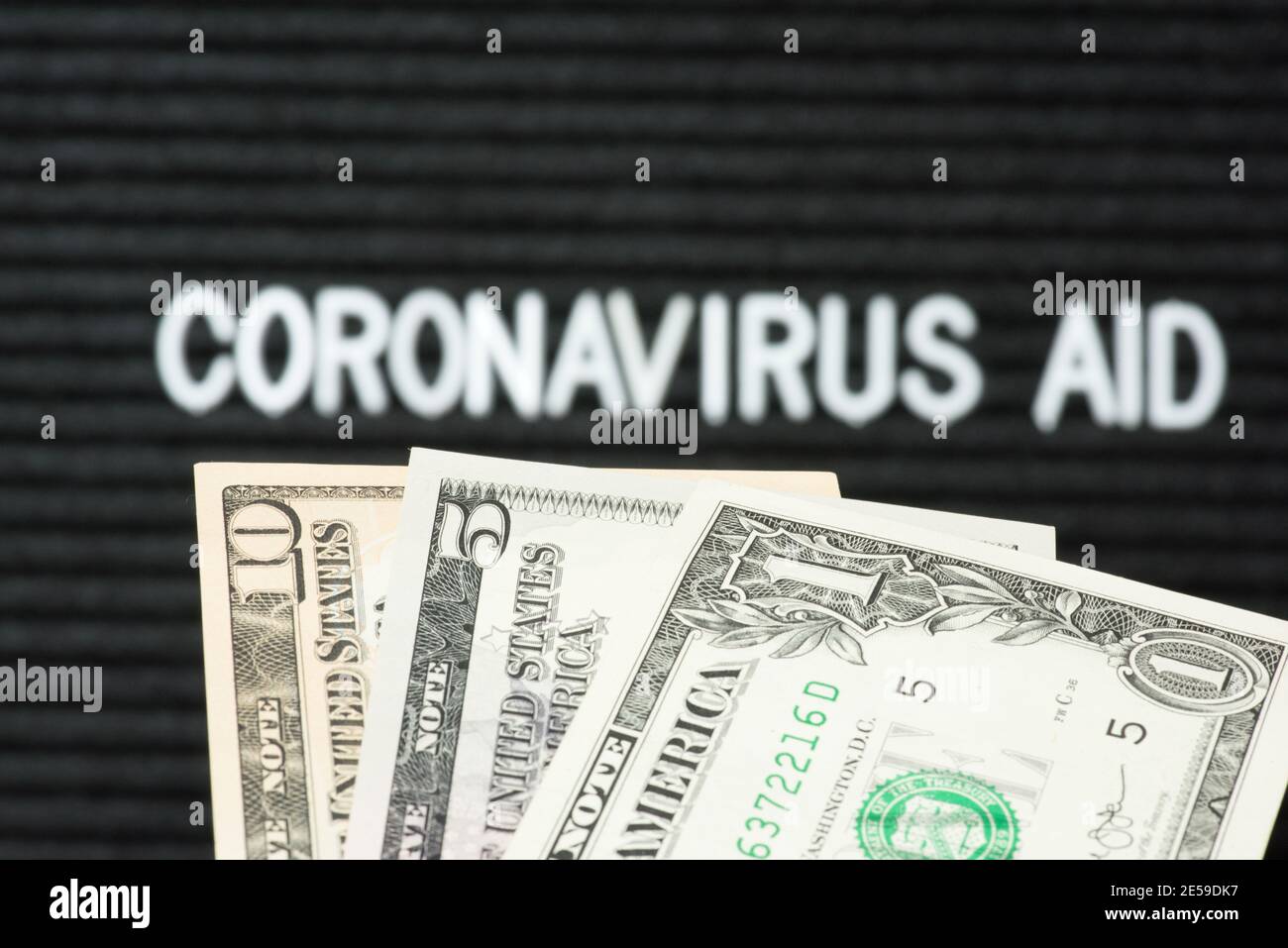 Dollar bills and aid to America's economy Stock Photo - Alamy