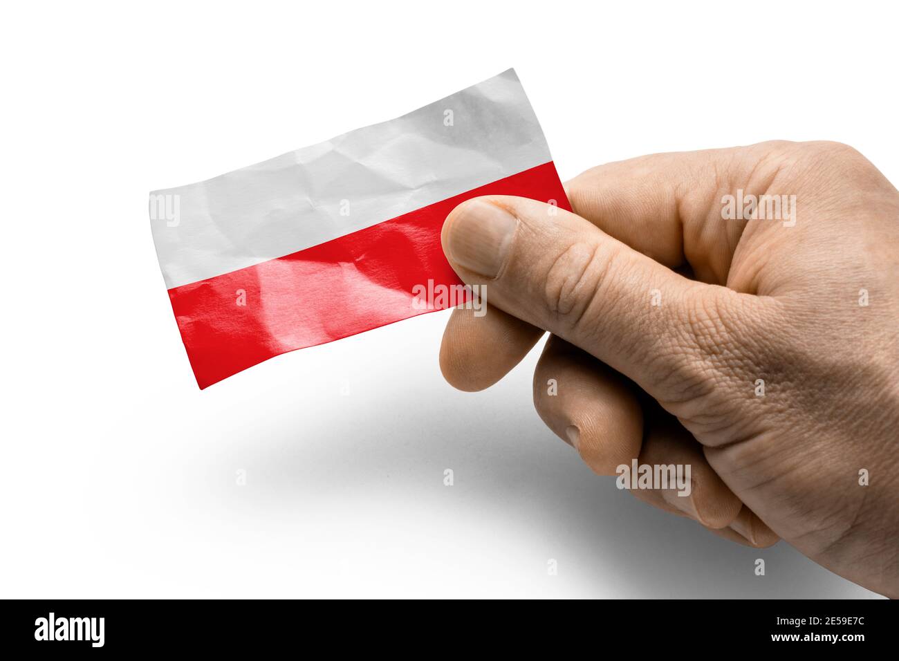 Hand holding a card with a national flag the Poland Stock Photo - Alamy