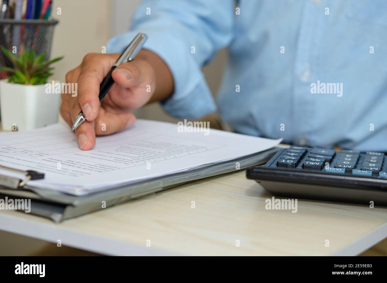Business men look documents hi-res stock photography and images - Alamy