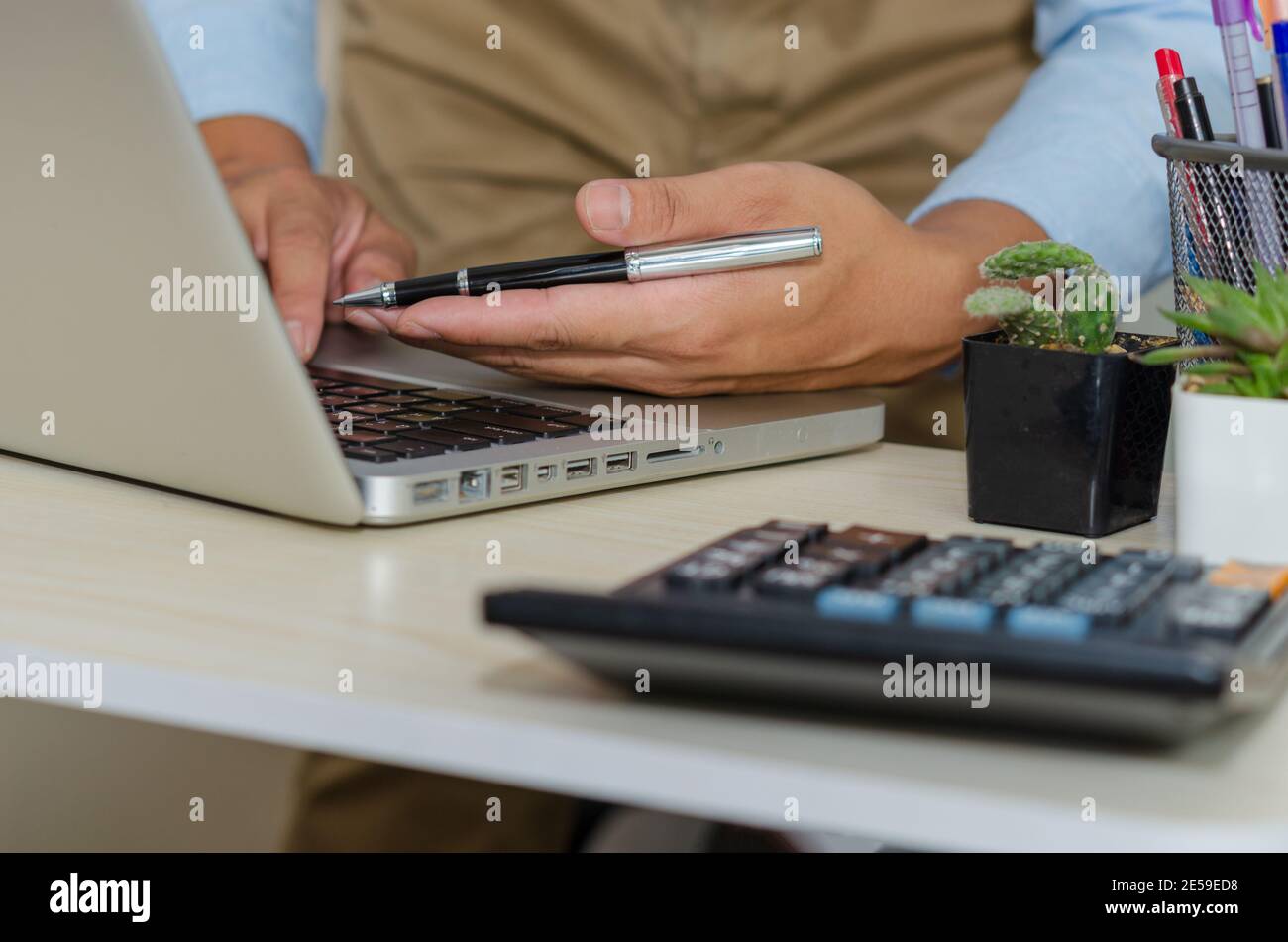 Business men are using computers to find information, the Internet ...