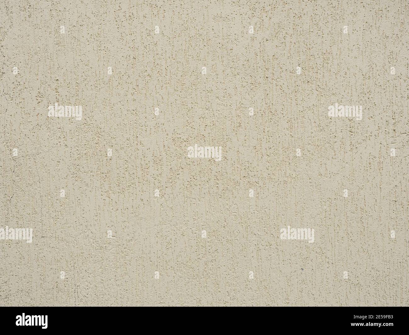 Beige wall with decorative plaster with patterned scratches. Texture ...