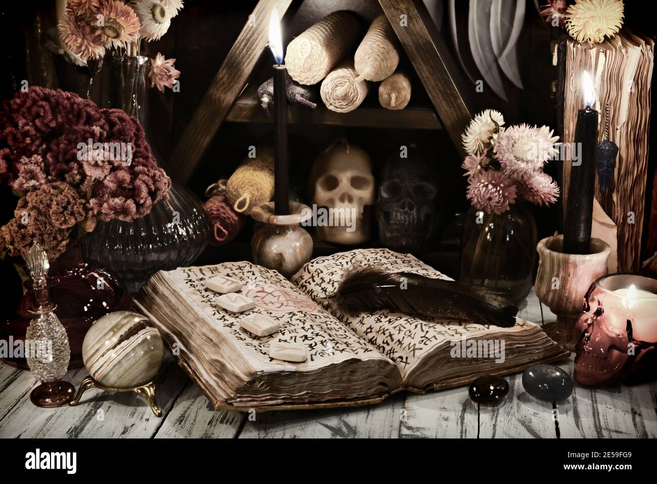 Still life with old grimoire book of magic spells, runes and evil ...