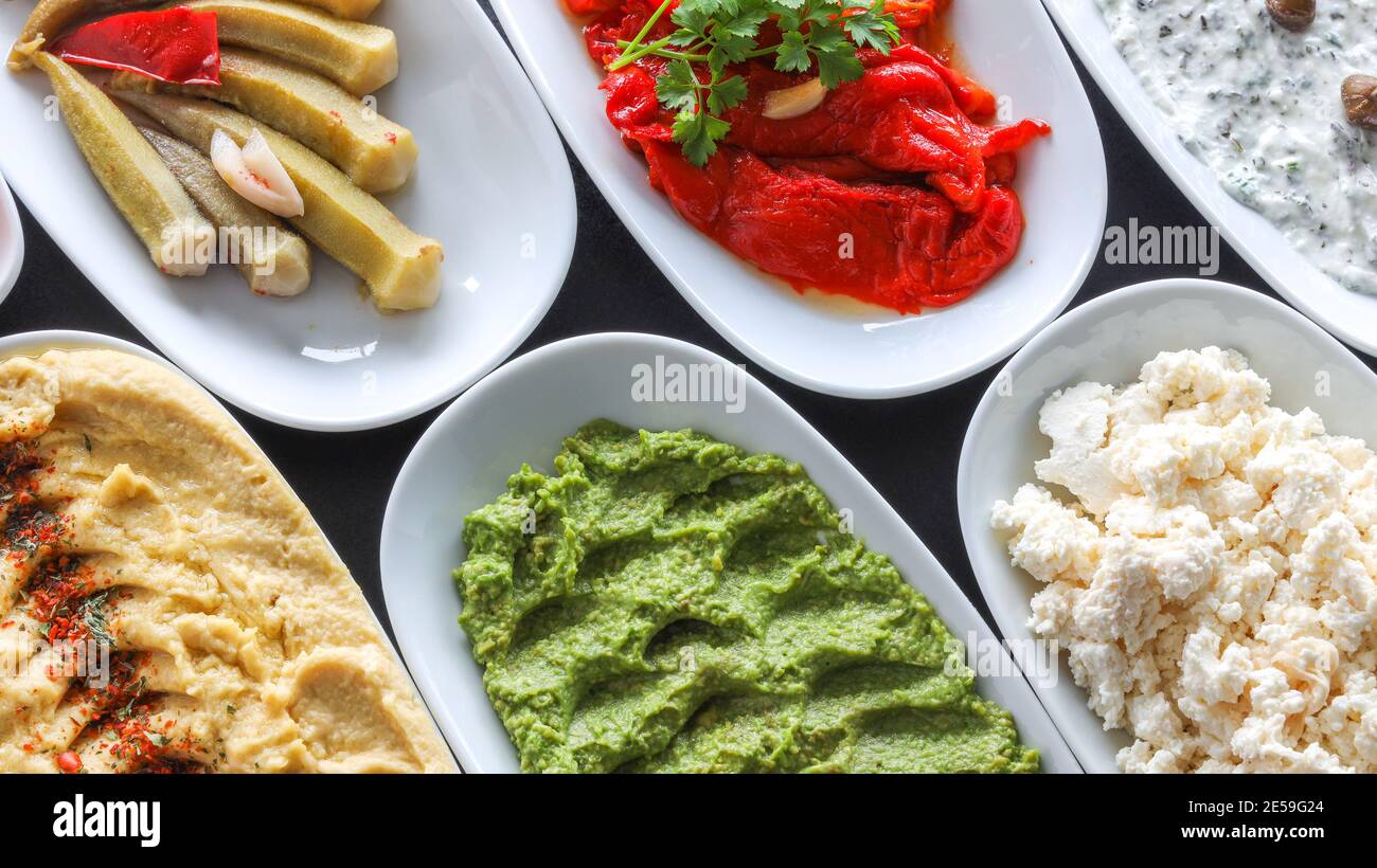 Top view of traditional Turkish and Greek vegetable dinner meze table ...
