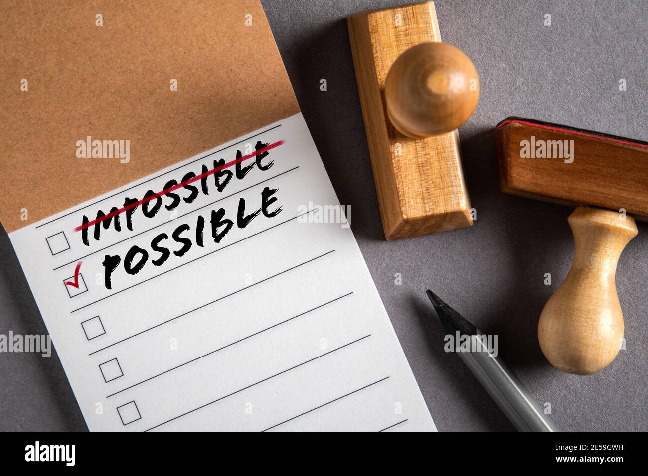 Impossible and possible concept. Business background. Grey office desk ...