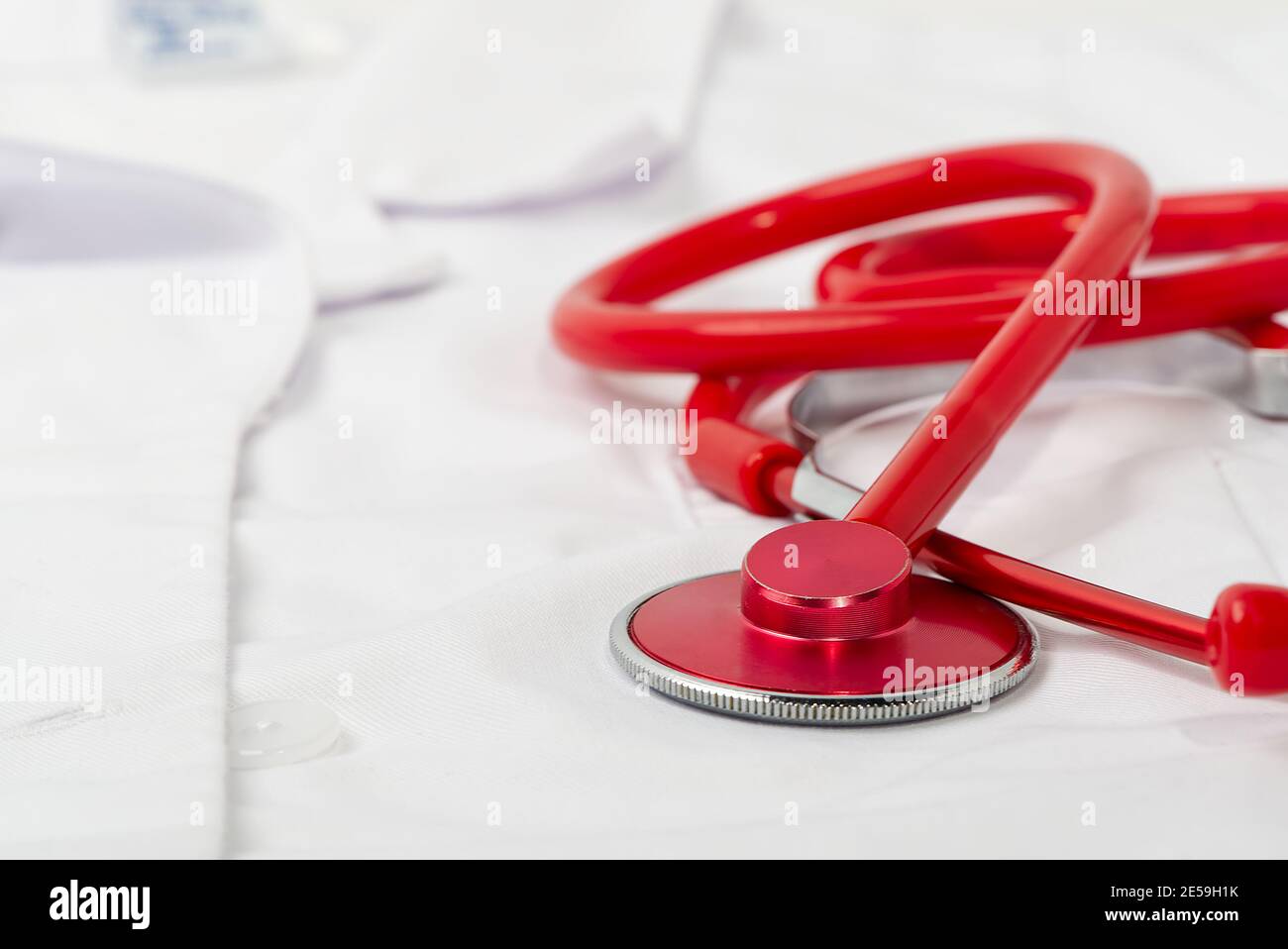 Red stethoscope on white background, close up Stock Photo - Alamy