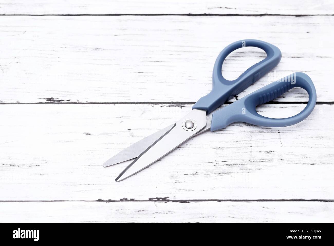 Blue handled scissors hi-res stock photography and images - Alamy