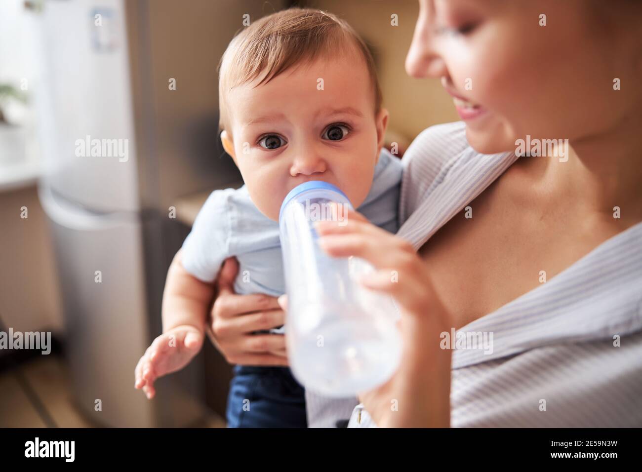 Portrait of cute child that staring at camera Stock Photo - Alamy