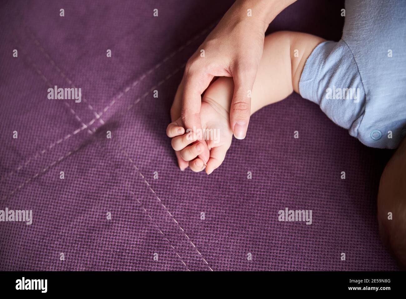 Mother raising hand to child hi-res stock photography and images - Alamy