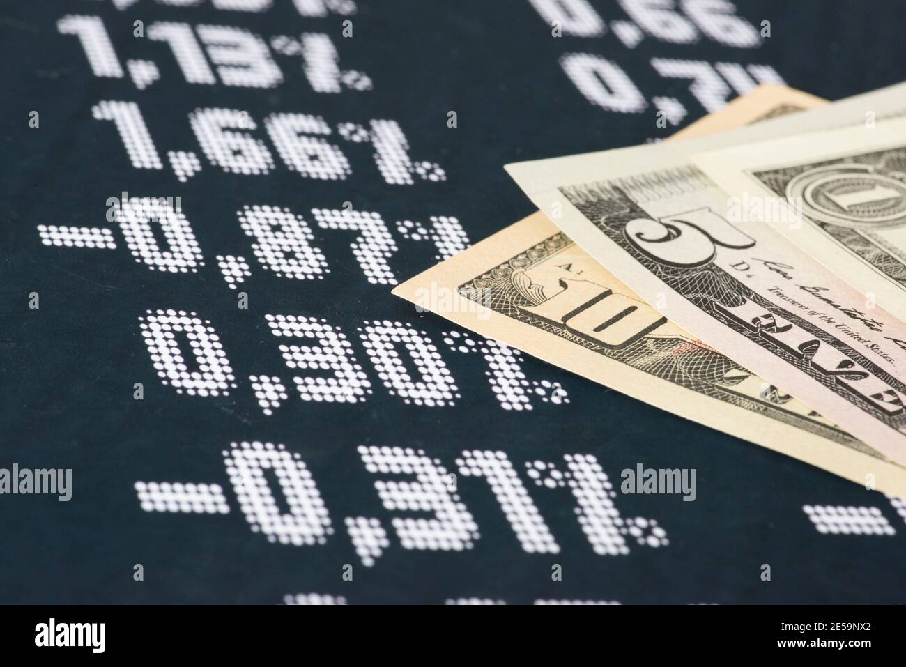 Dollar bills and stock market in America Stock Photo - Alamy