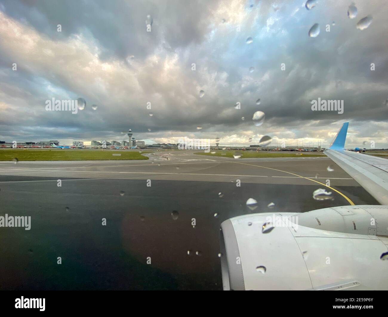 Ready for takeoff at the airport on a bad weather rainy day. Looking ...