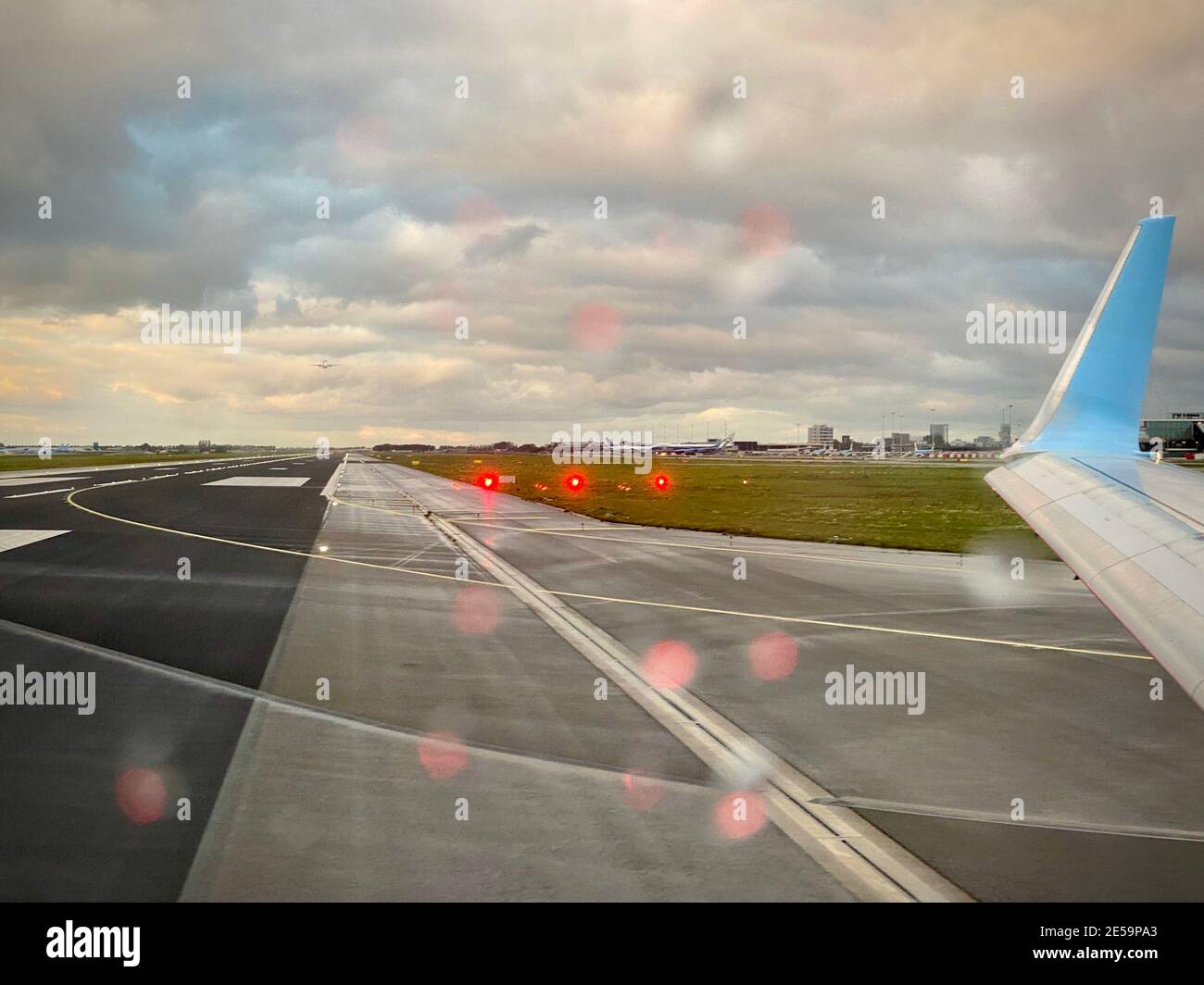 Ready for takeoff at the airport on a bad weather rainy day. Looking ...