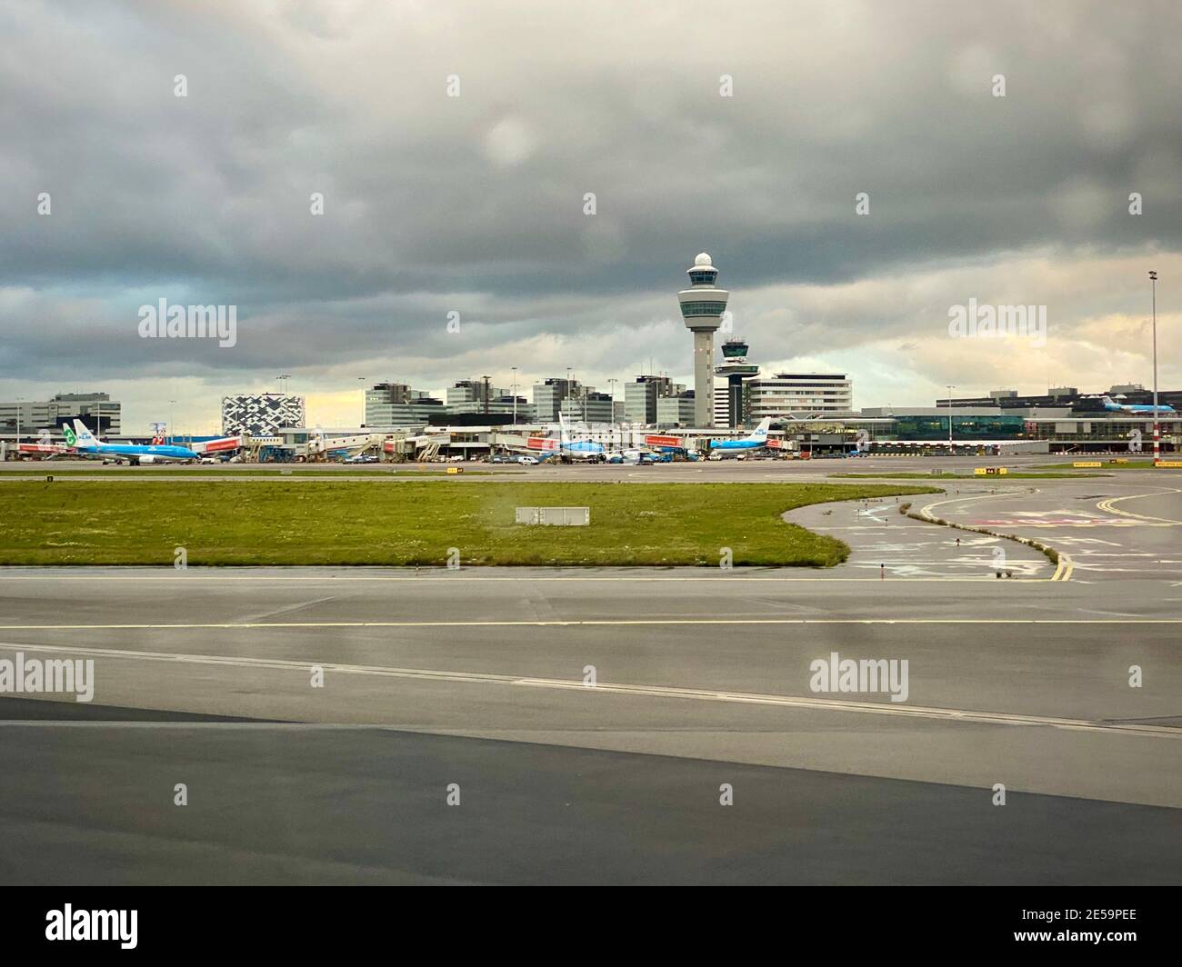 Ready for takeoff on a bad weather rainy day. Looking out aircraft ...