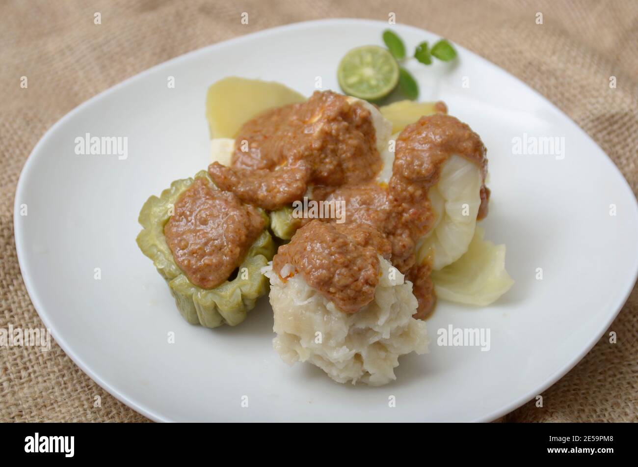 Siomay is an Indonesian steamed fish dumpling with vegetables served in ...