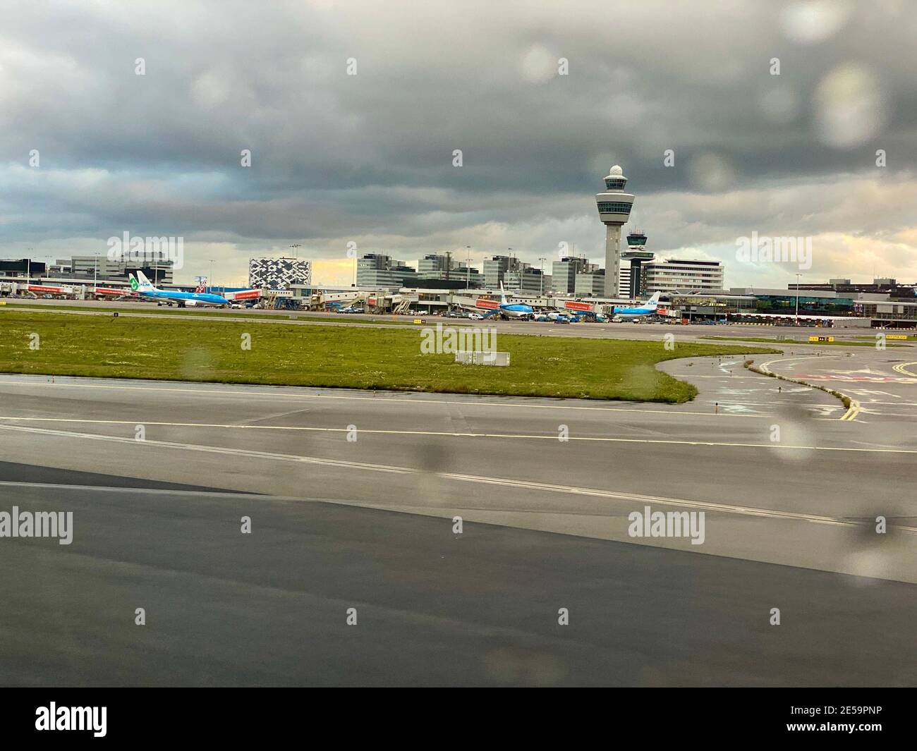 Ready for takeoff on a bad weather rainy day. Looking out aircraft ...