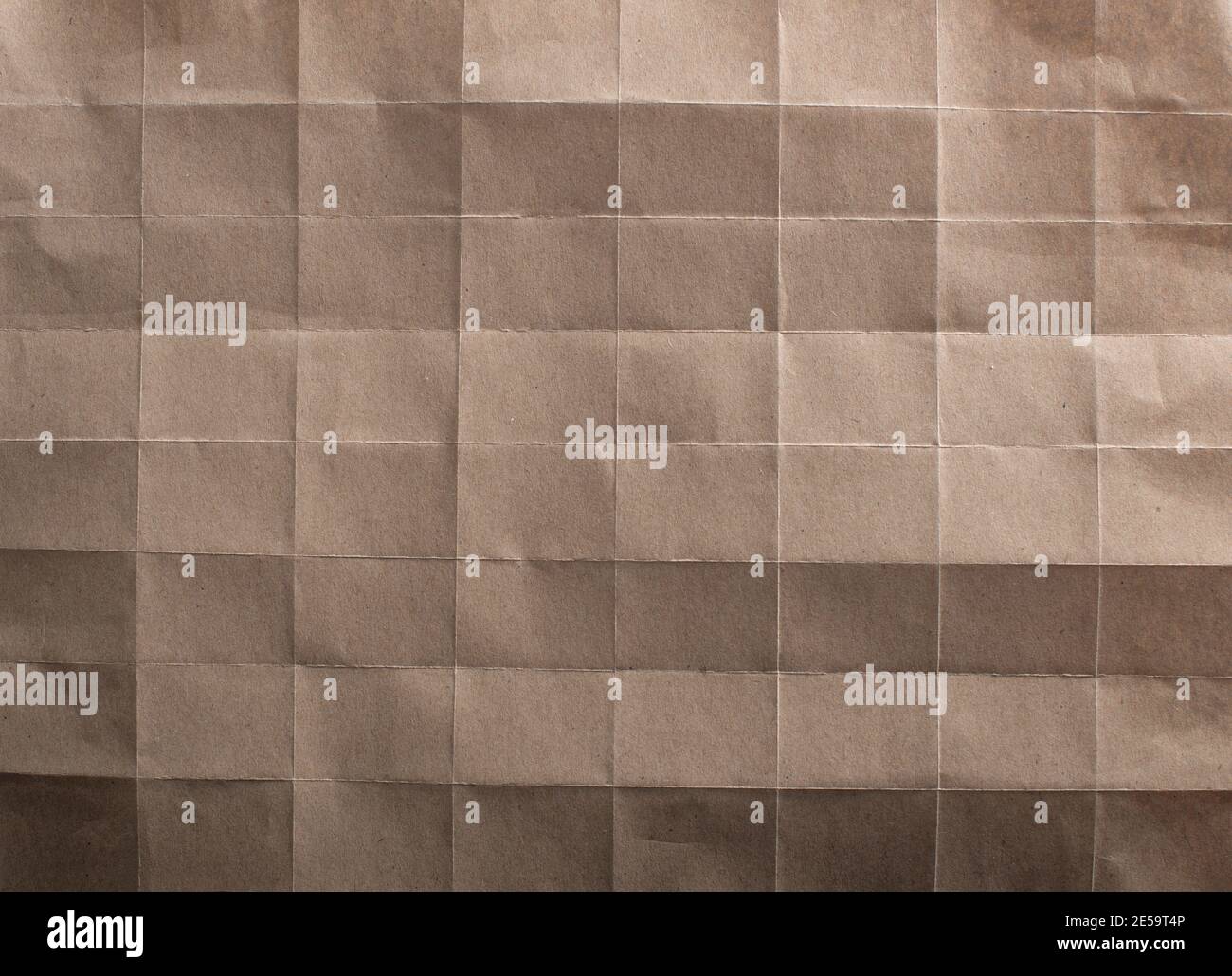 Folded brown paper texture. Top view Stock Photo - Alamy