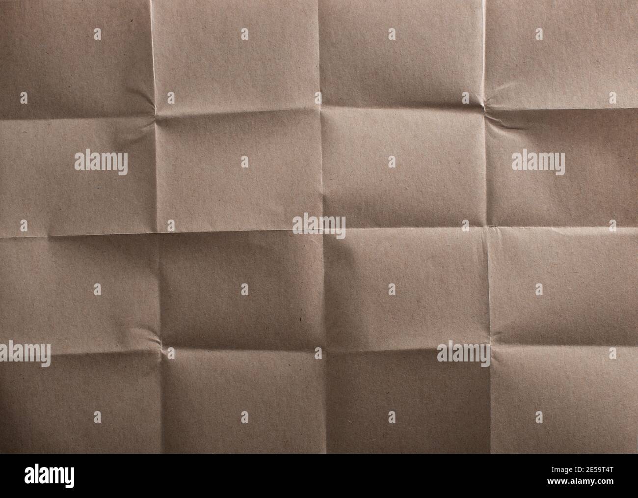 Folded brown paper texture. Top view Stock Photo - Alamy