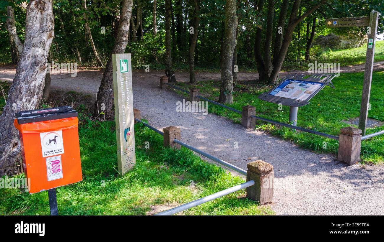 Flint, Flintshire; UK: Sept 17, 2020: A dog waste bin and signage ...