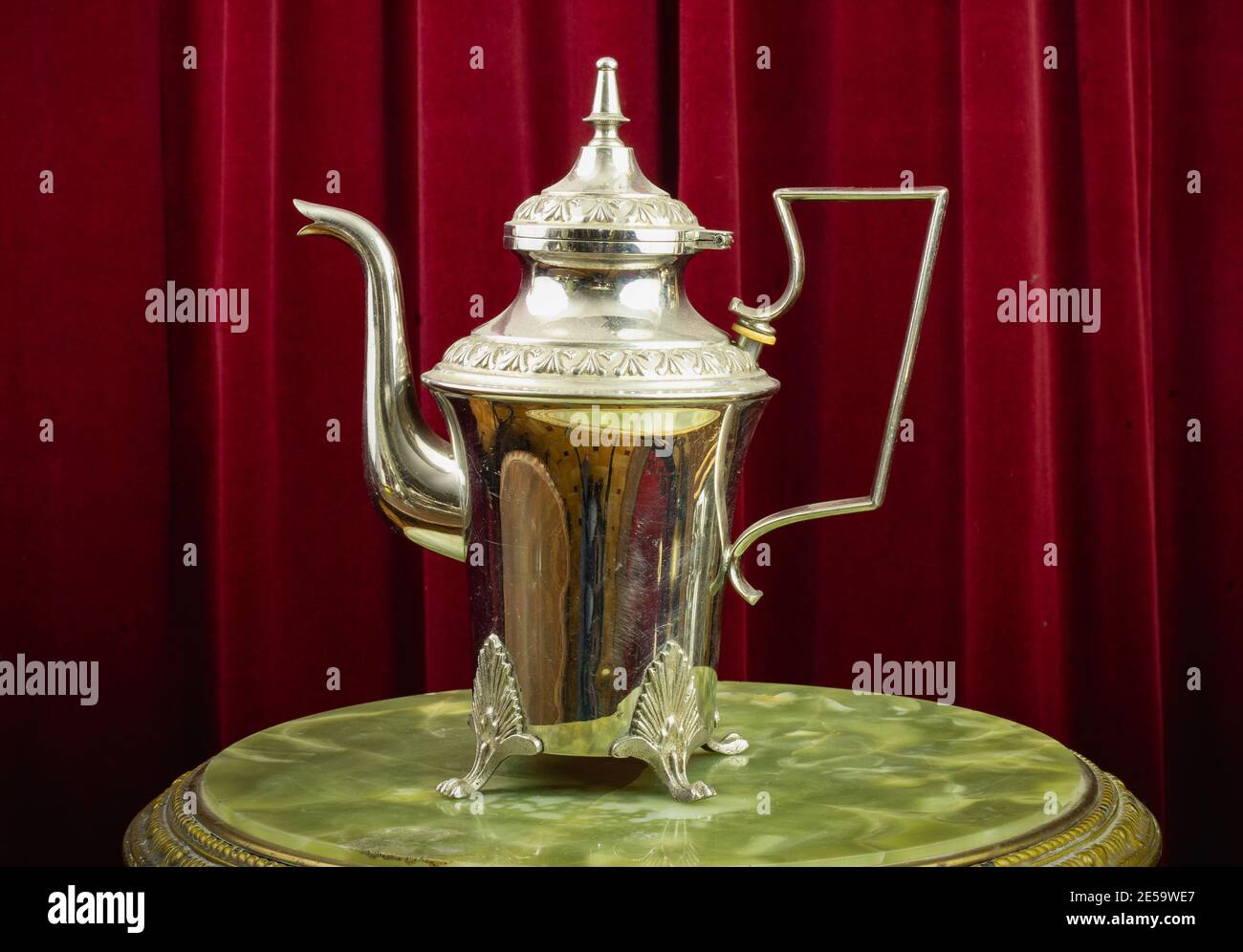 Vintage, shiny metallic teapot. Luxury kettle Stock Photo - Alamy