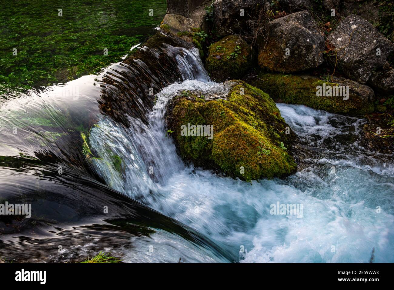 Water running over mossy rocks , Fontaine de Vaucluse , Provence France ...
