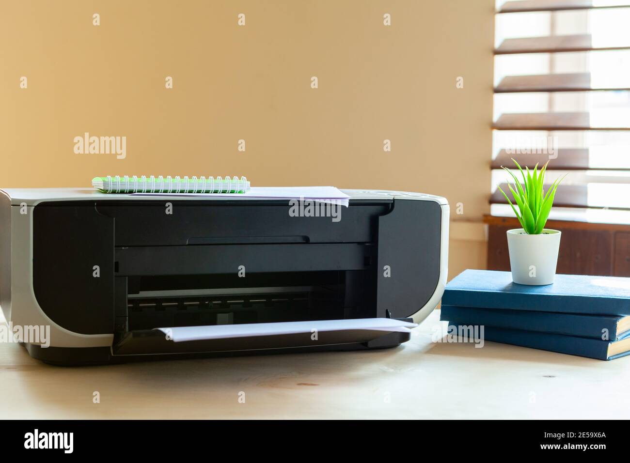 Close up of an office table with printer on it Stock Photo - Alamy