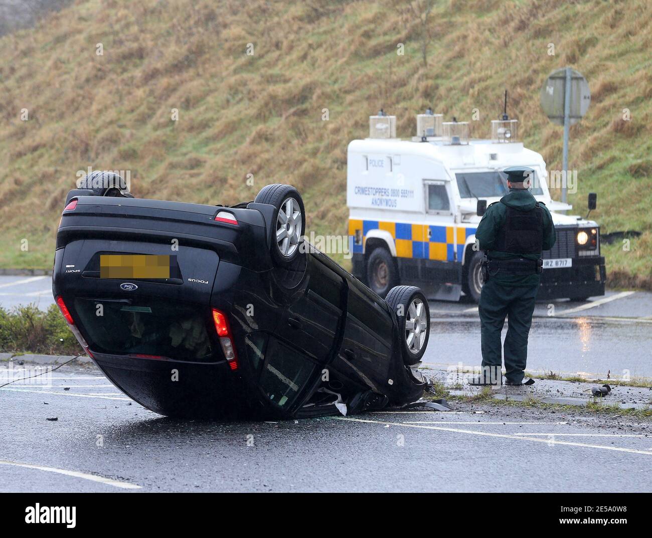 The scene on the Monagh Bypass in west Belfast after a car suspected of ...